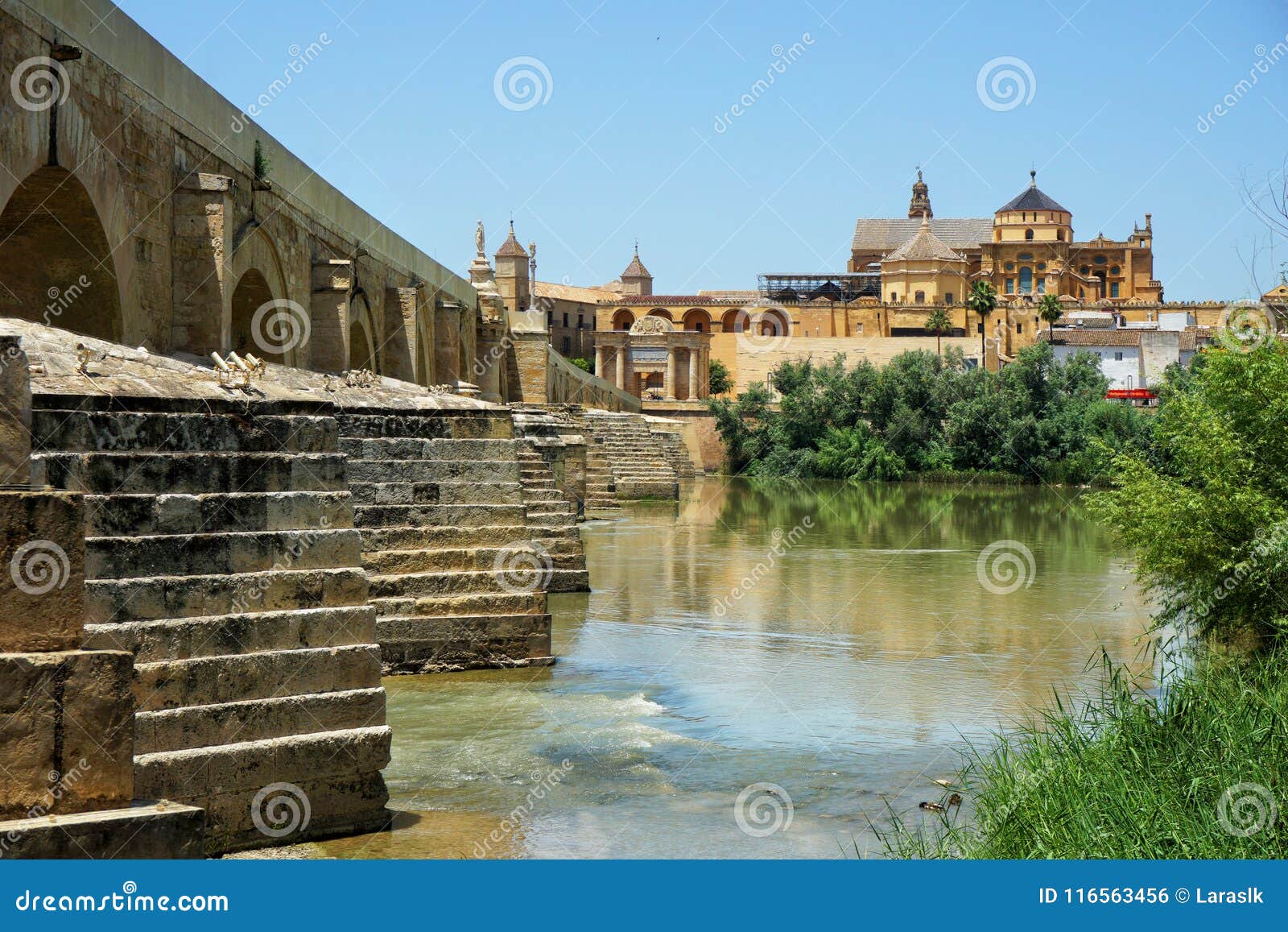 Romano Bridge in Cordoba stock photo. Image of tower - 116563456