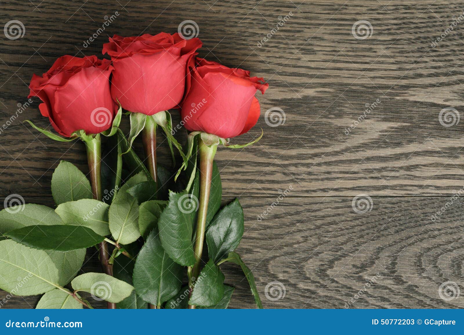 Romantic Background with Red Roses on Wood Table Stock Image - Image of ...