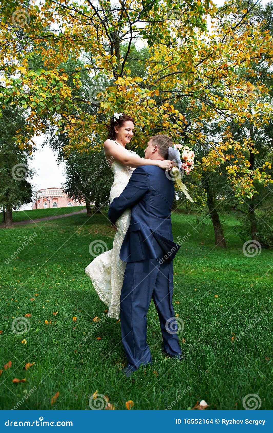 Romantic Bride and Groom Embrace Stock Photo - Image of park, hugs ...