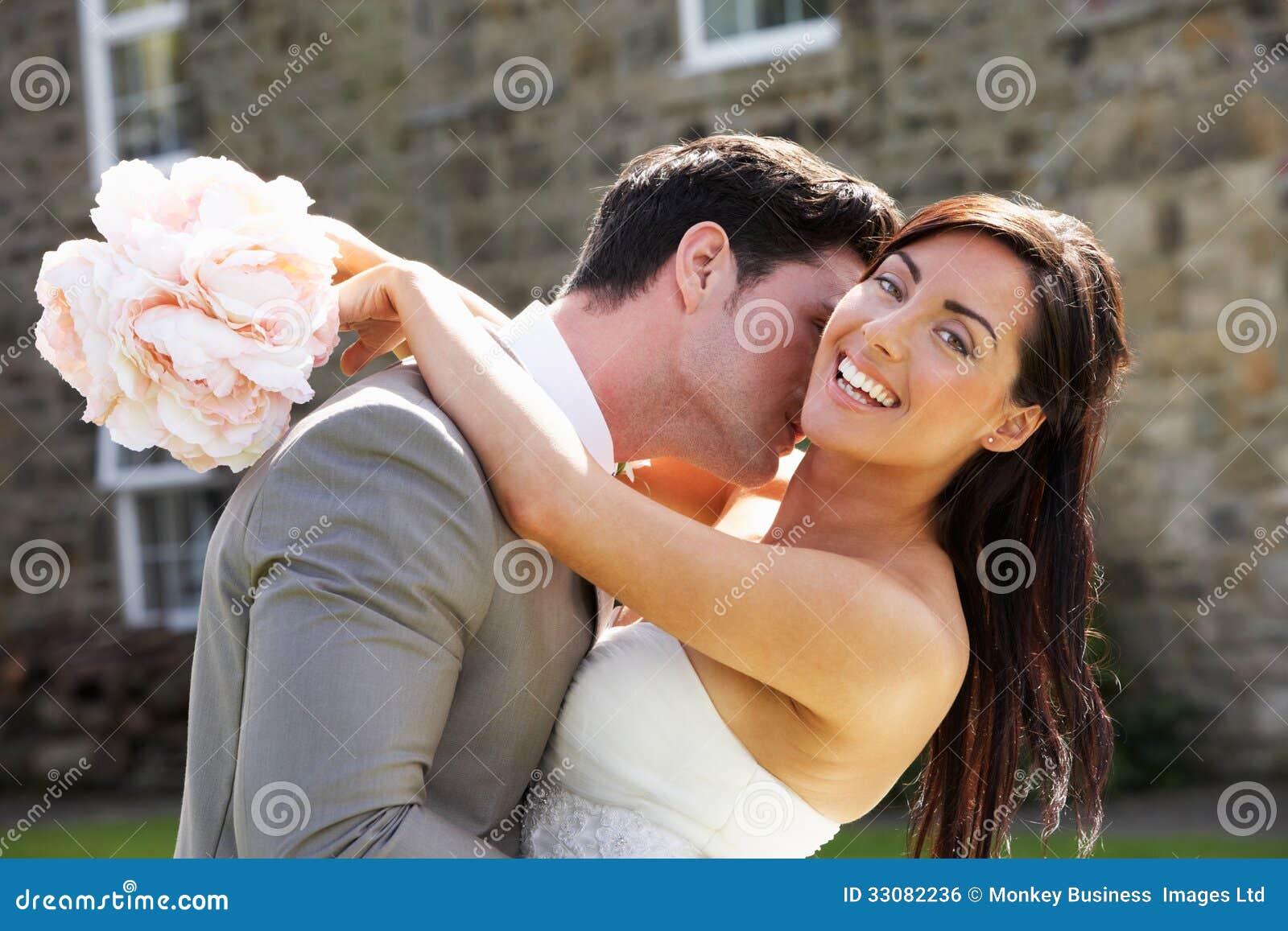 Romantic Bride and Groom Embracing Outdoors Stock Photo - Image of ...