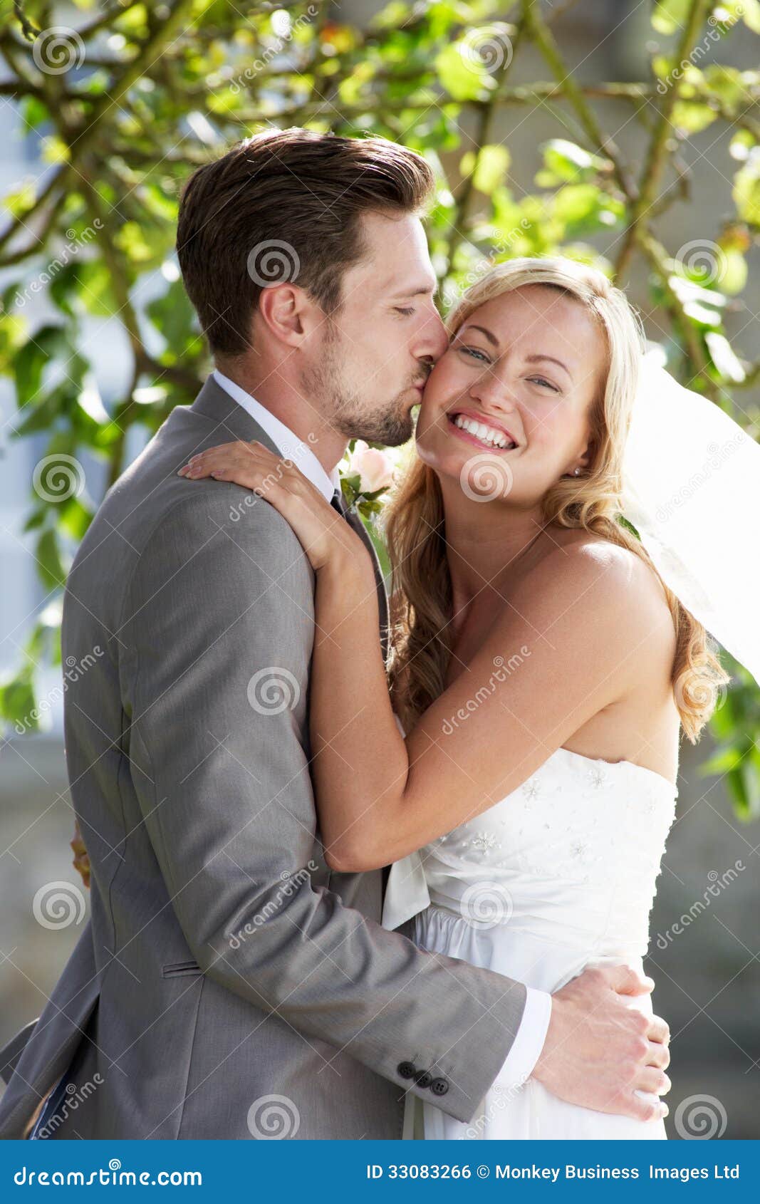 Romantic Bride and Groom Embracing Outdoors Stock Photo - Image of ...