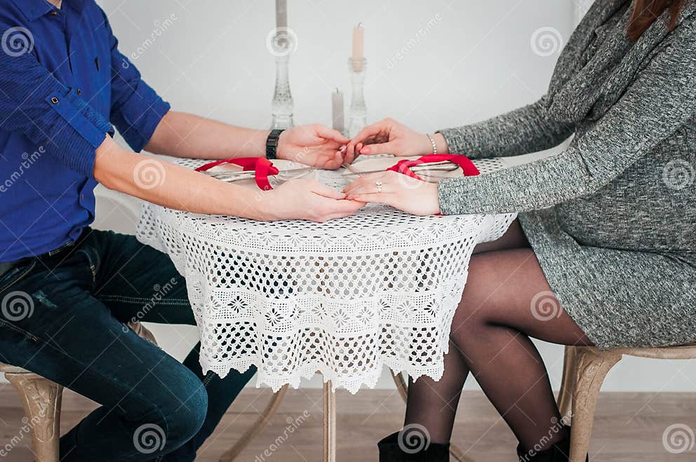 Romantic Connection between Two People at a Cozy Table Setting Stock ...