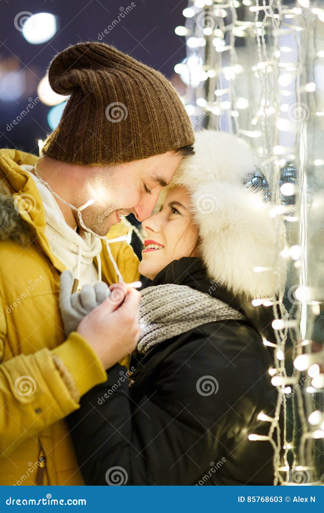 Romantic Couple Against City Lights Stock Image - Image of care ...