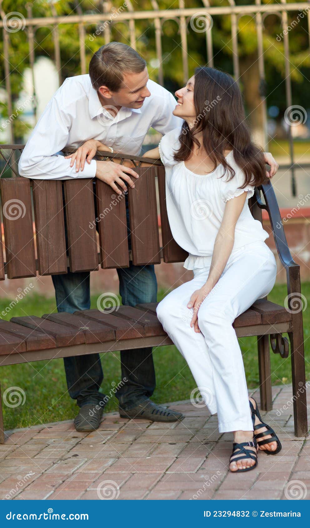 Romantic Couple on the Bench Stock Photo - Image of brunette, bench ...