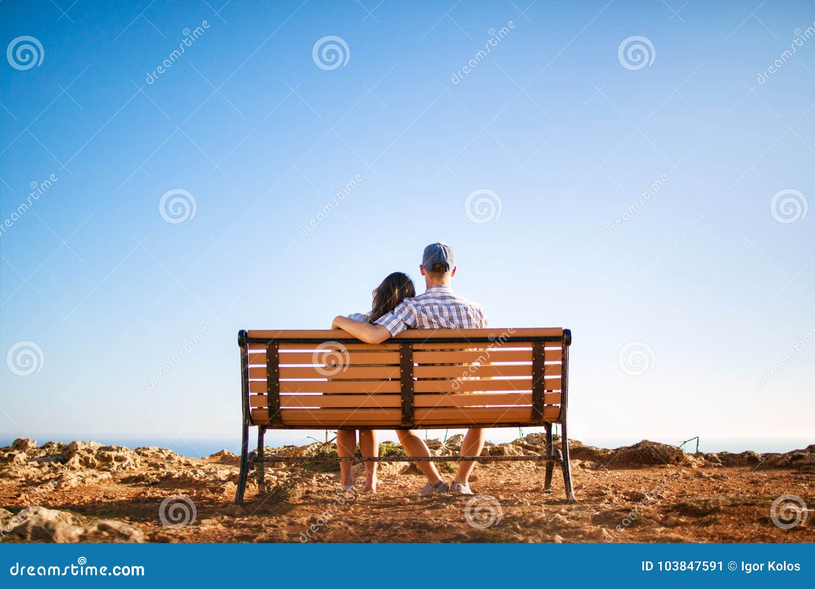 Romantic couple on bench stock image. Image of together - 103847591