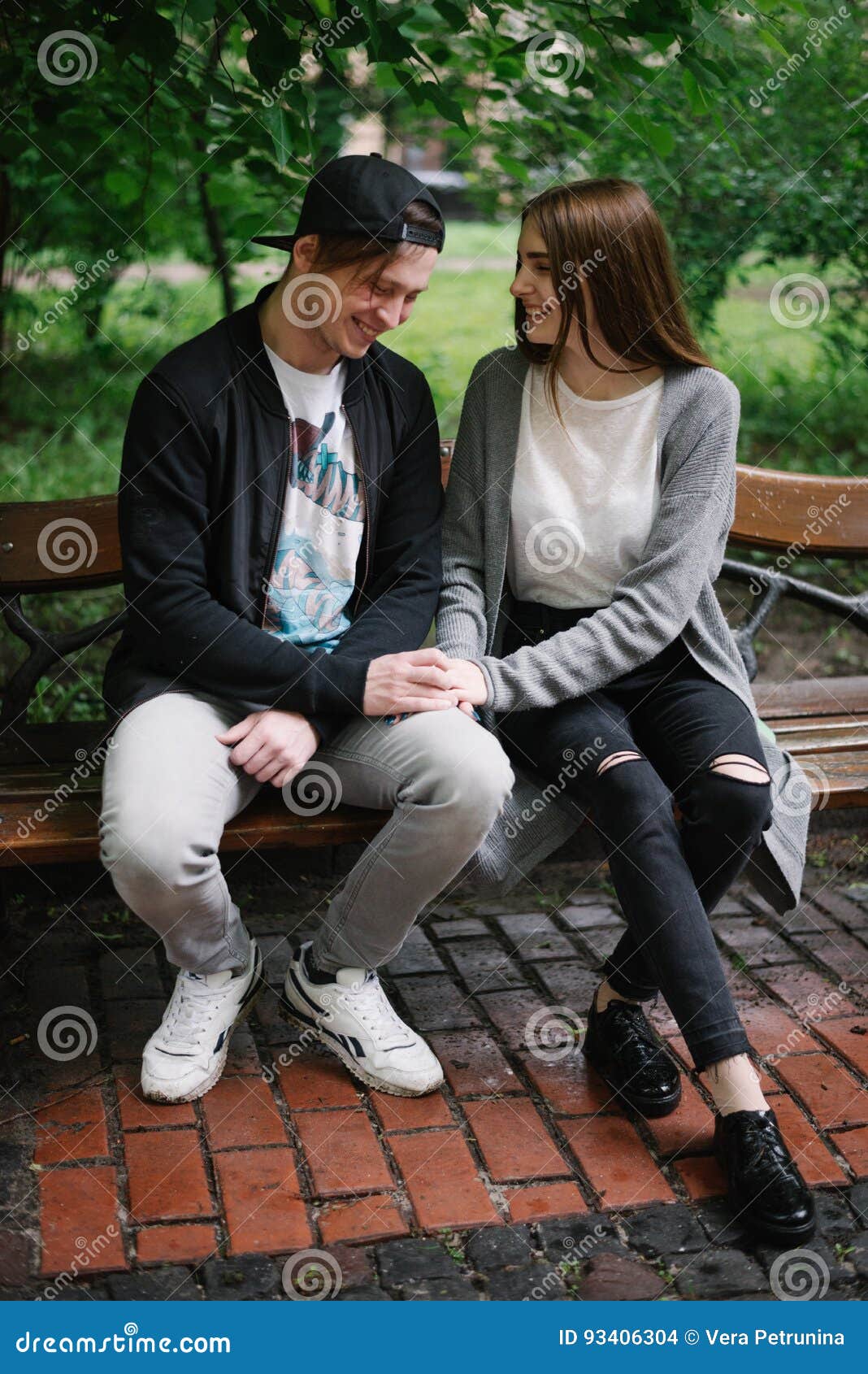 Romantic couple on bench stock photo. Image of caucasian - 93406304