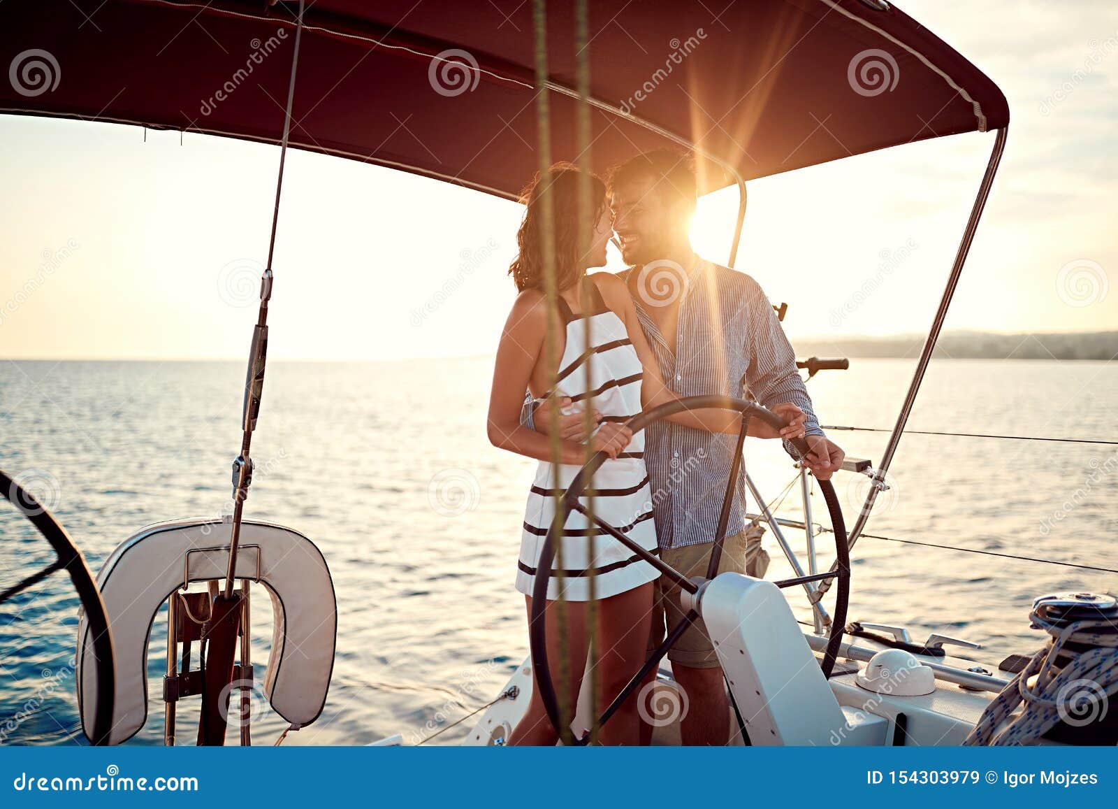 Romantic Couple on Boat Enjoy Together at Sunset Stock Image - Image of ...