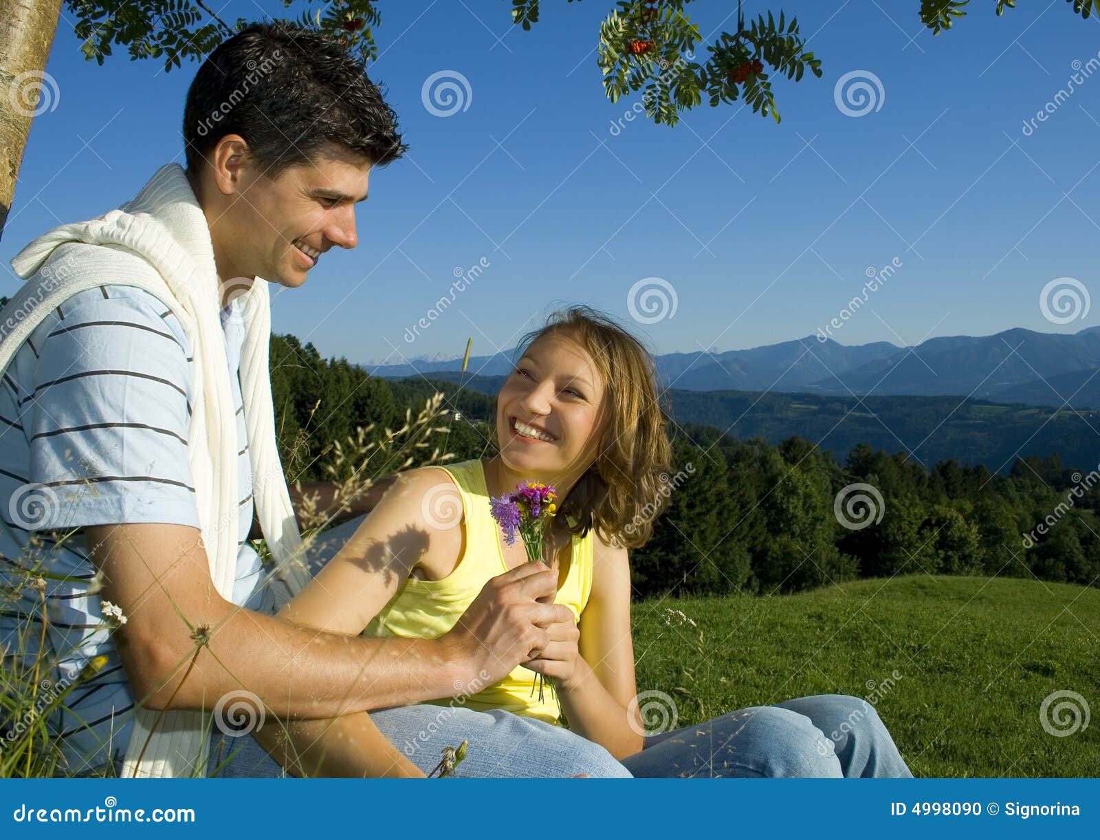 Romantic Couple in Countryside Stock Photo - Image of giving, landscape ...