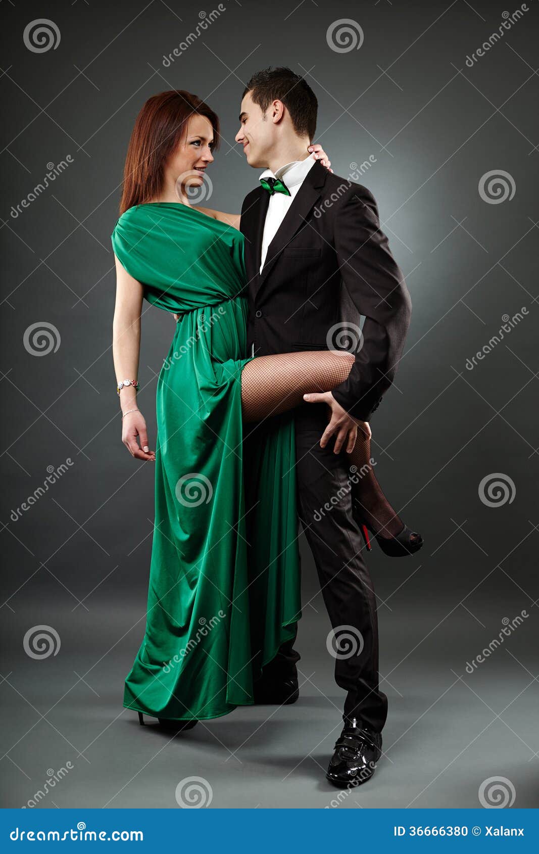 Romantic Couple Dancing Tango on Gray Background Stock Photo - Image of ...