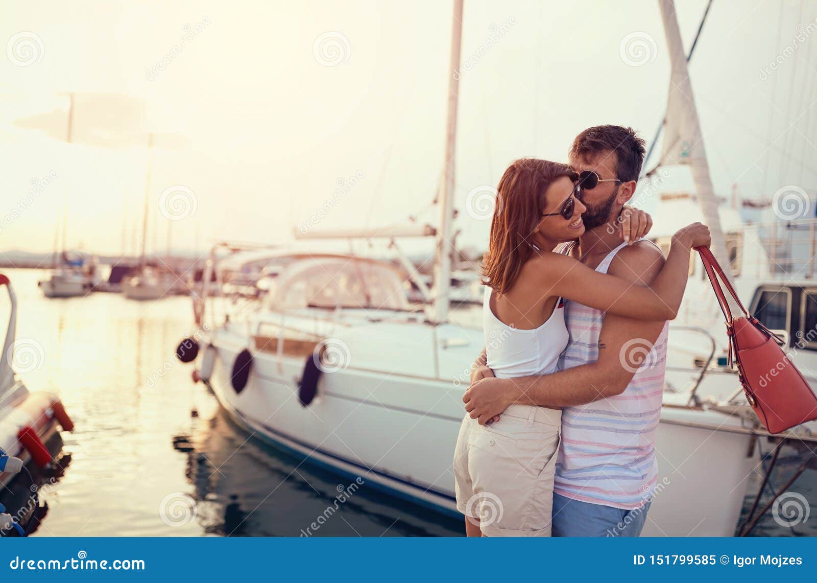 Romantic Couple on the Dock at Sunset Stock Image - Image of couple ...