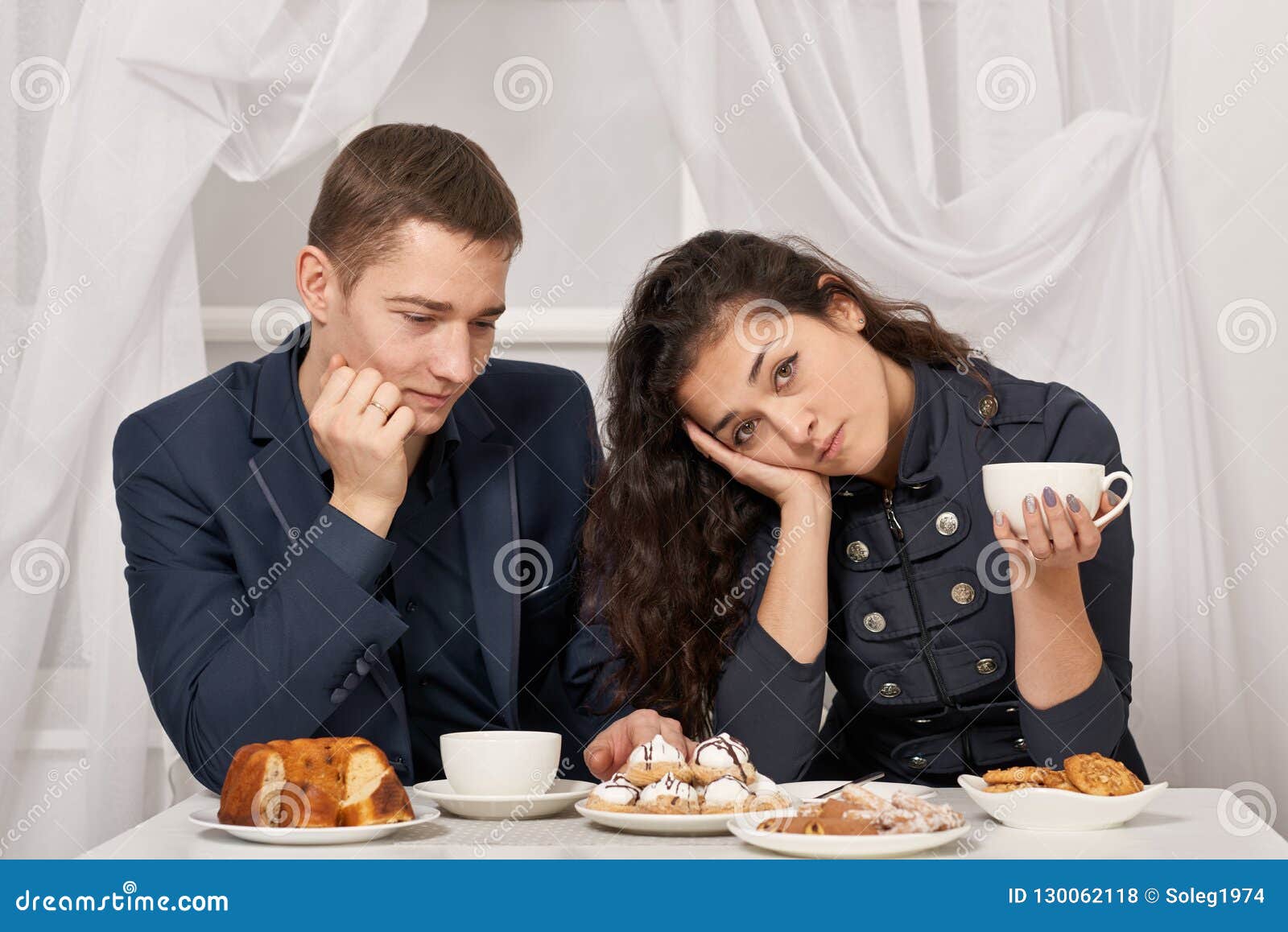 Romantic Couple Drinking Tea with Cookies and Talking Stock Photo ...