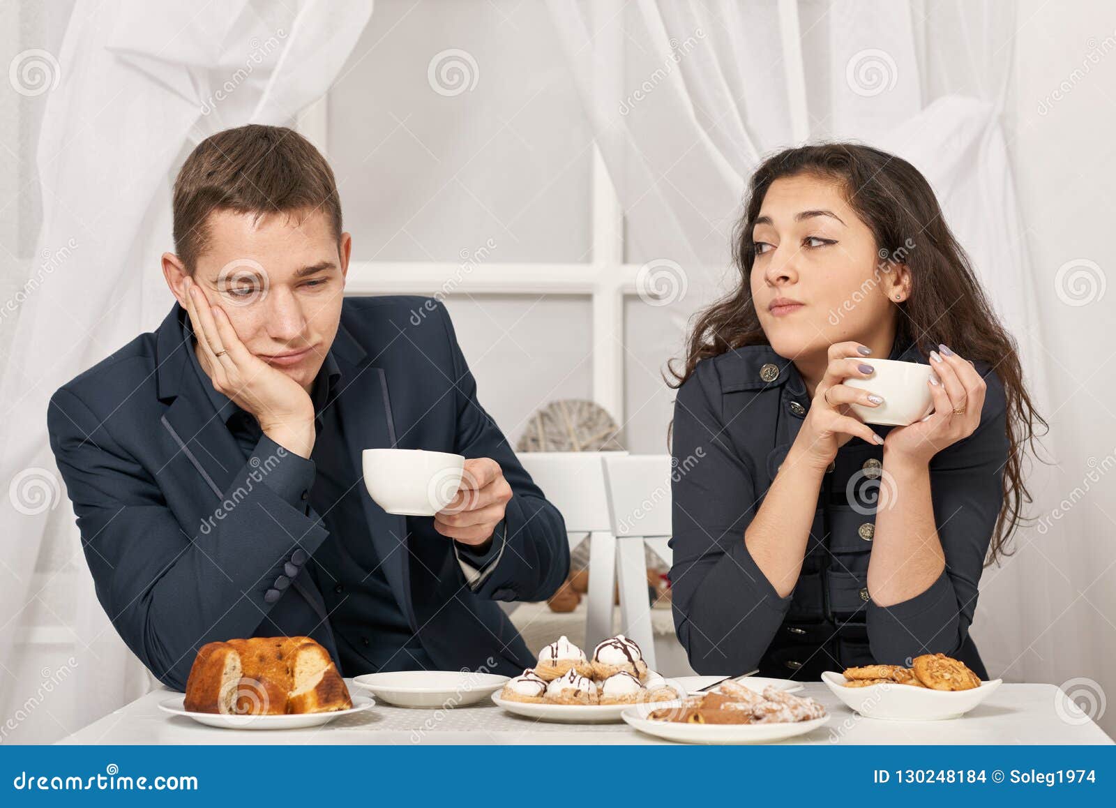 Romantic Couple Drinking Tea with Cookies and Talking Stock Photo ...