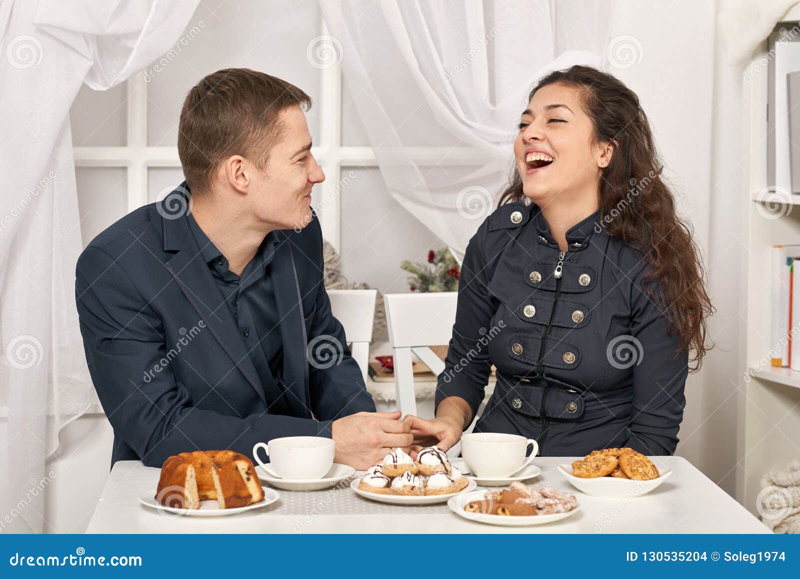 Romantic Couple Drinking Tea with Cookies and Talking Stock Photo ...