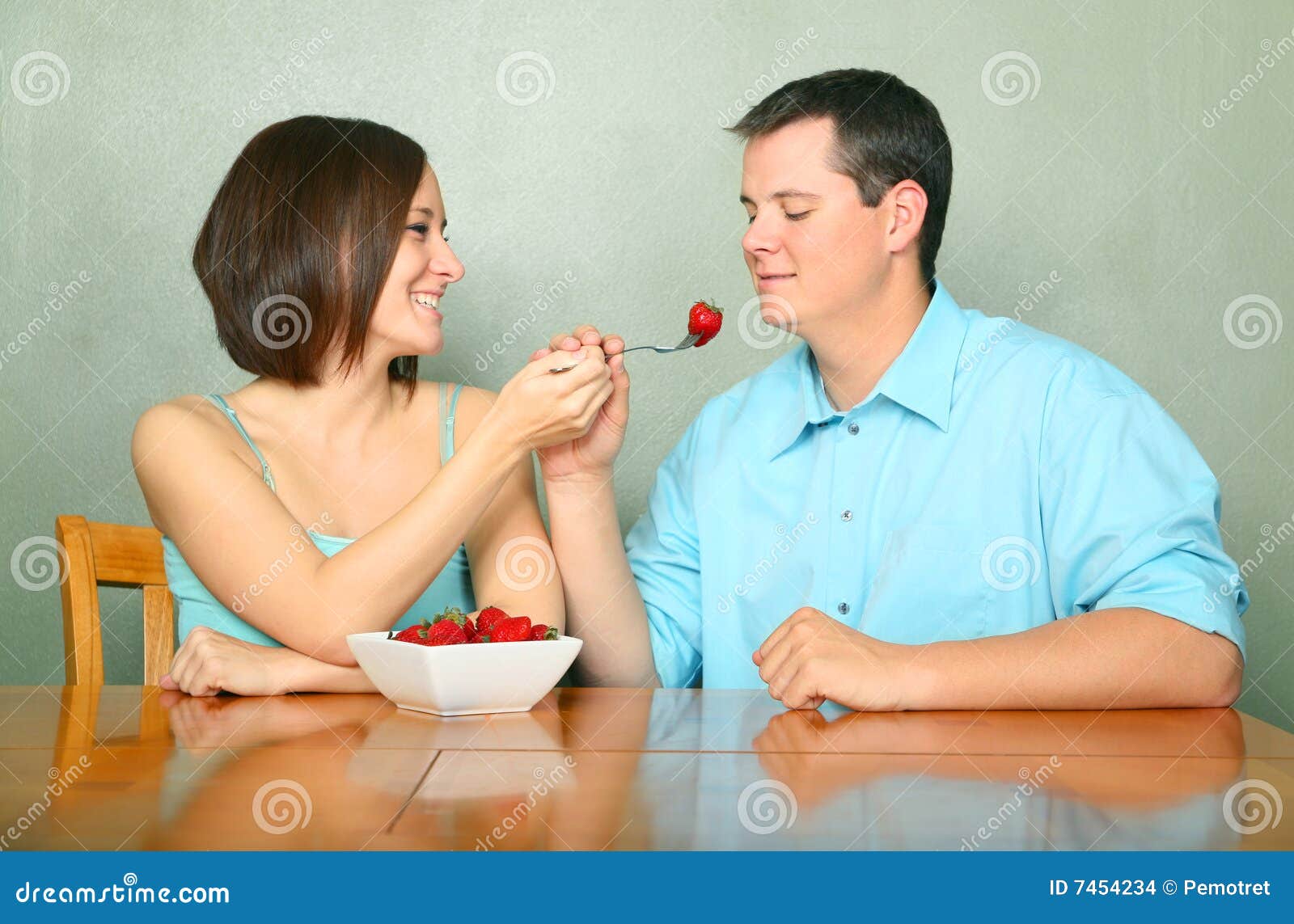 Romantic Couple Eating Fruits on Kitchen Table Stock Photo - Image of ...