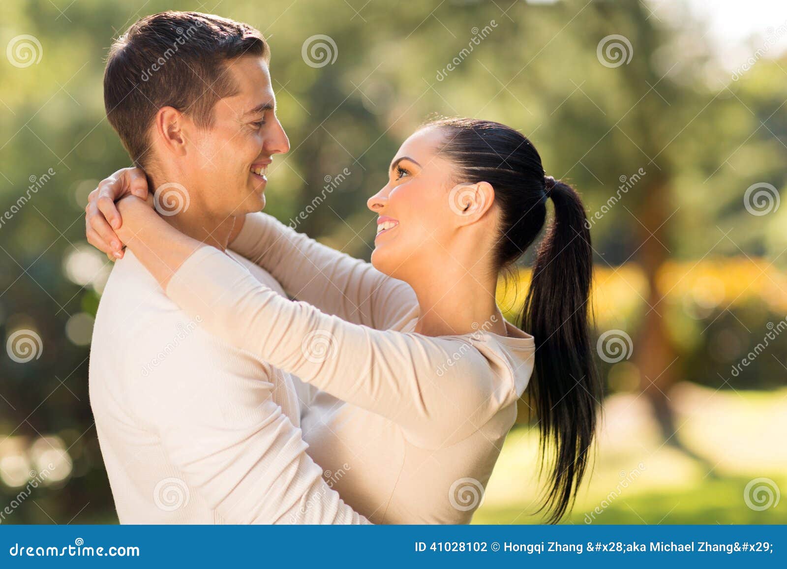 Romantic couple embracing stock photo. Image of hugging - 41028102