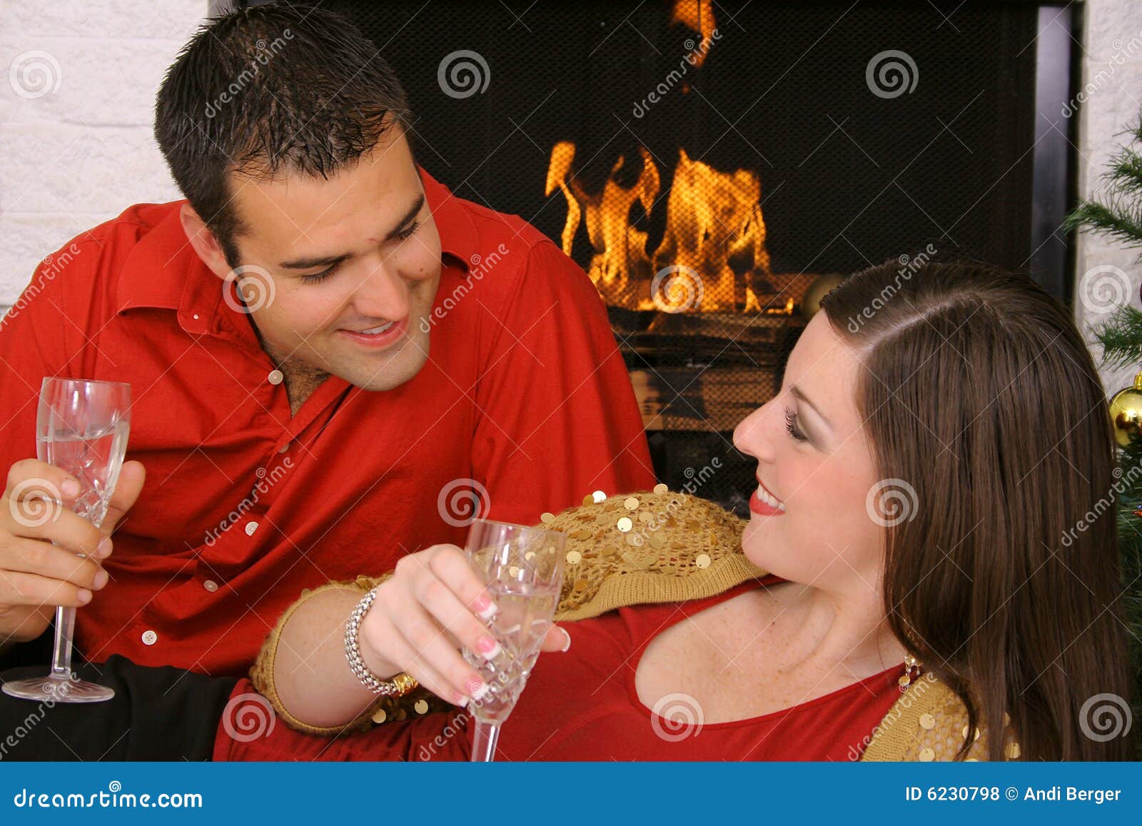 Romantic Couple by Fireplace Stock Photo - Image of romantic, beautiful ...