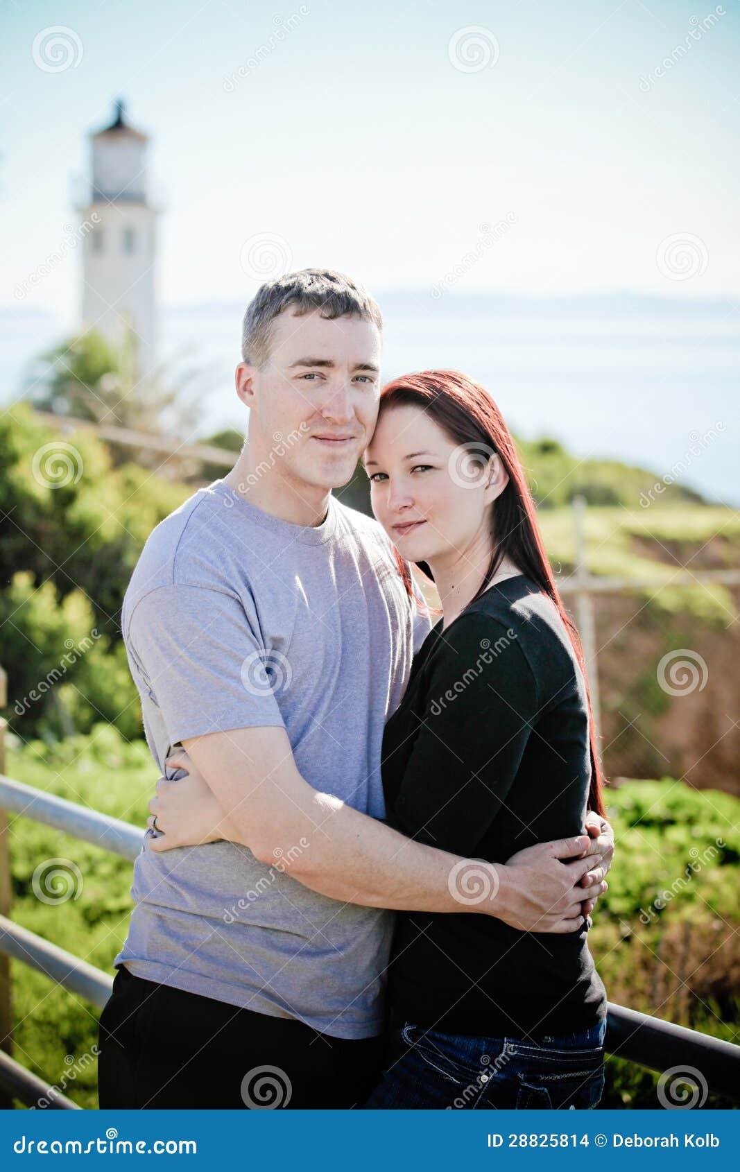 Romantic Couple in Front of a Lighthouse in California Stock Photo ...