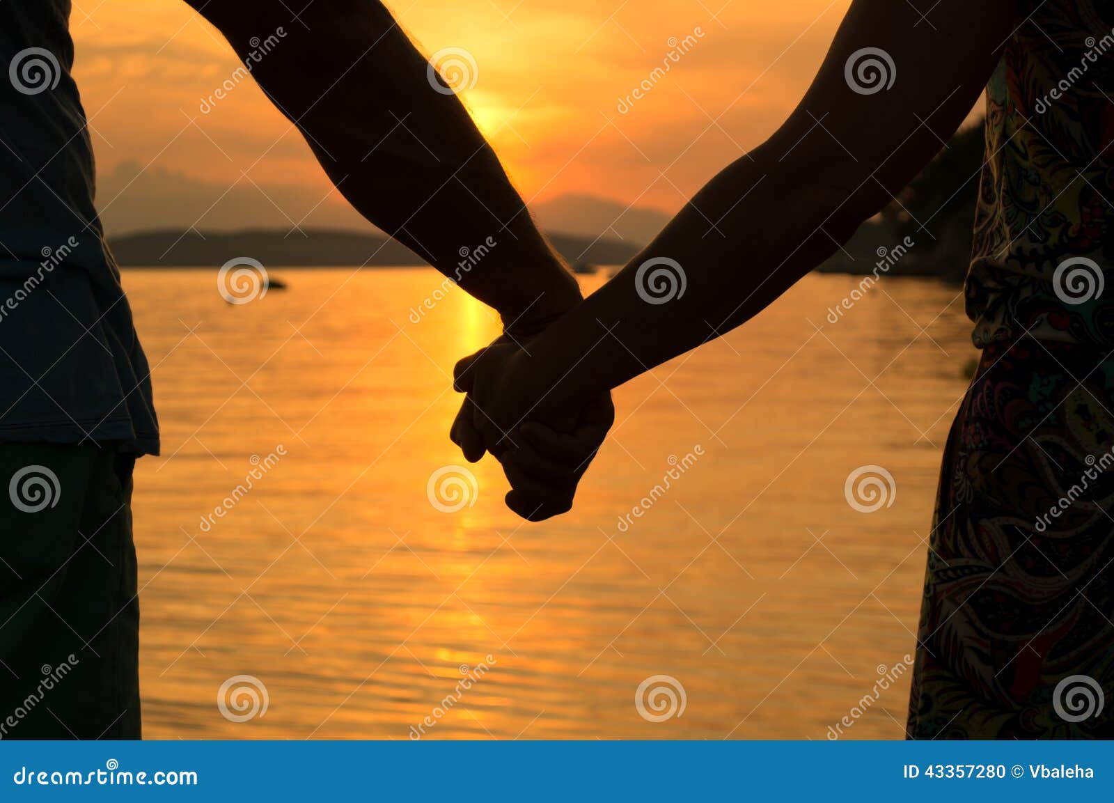 Romantic Couple Holding Hands Stock Photo - Image of holding, honeymoon ...