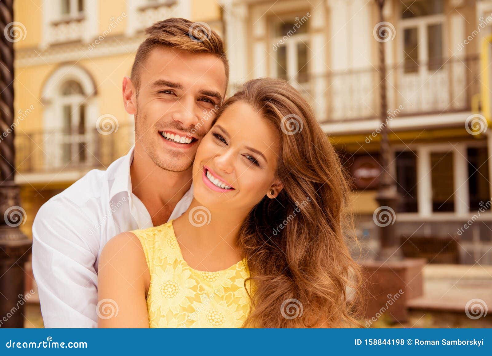 Romantic Couple in Love on the Background of Buildings Stock Photo ...