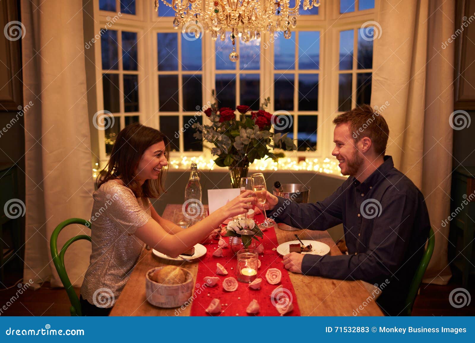 Romantic Couple Make a Toast at Valentines Day Meal Stock Image - Image ...