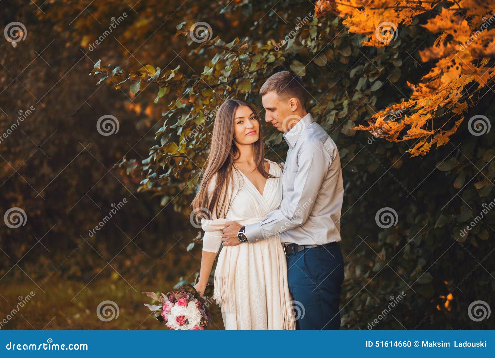 Romantic couple in park stock photo. Image of bouquet - 51614660