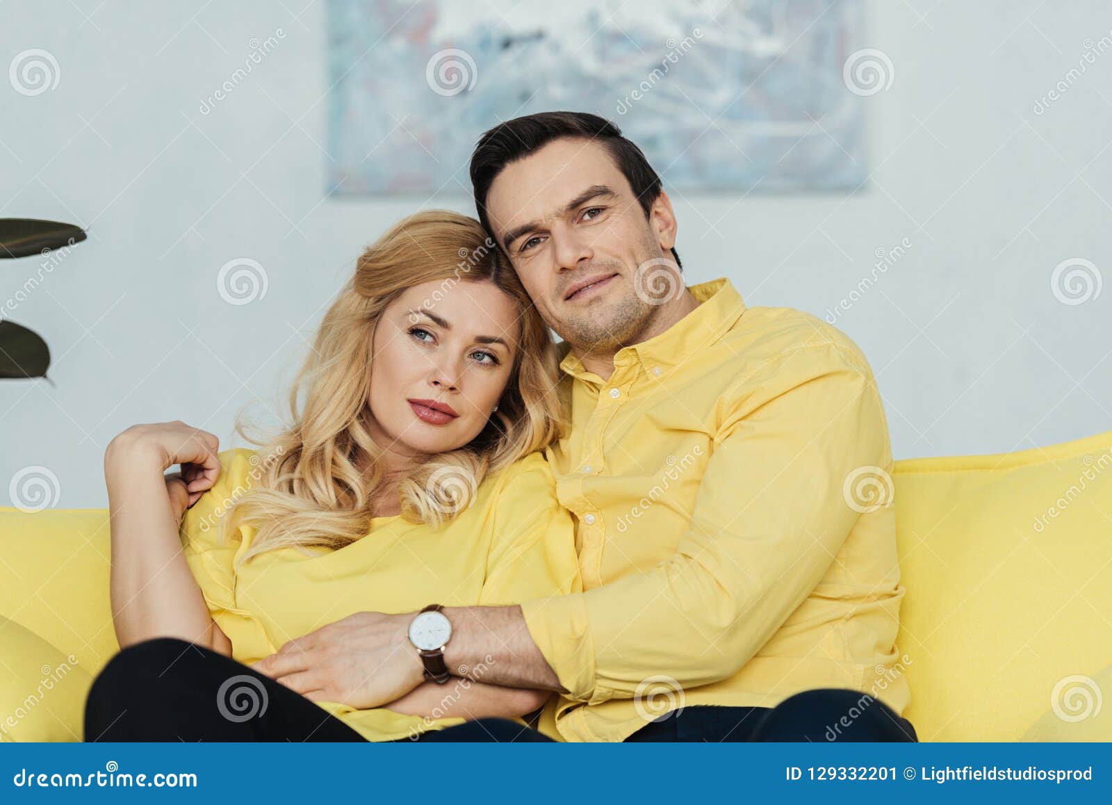Romantic Couple Sitting and Embracing Stock Image - Image of candid ...