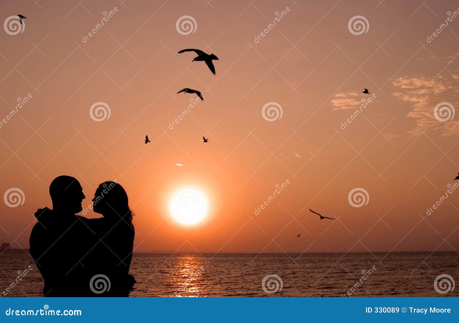 Romantic couple at sunset stock image. Image of attachment - 330089
