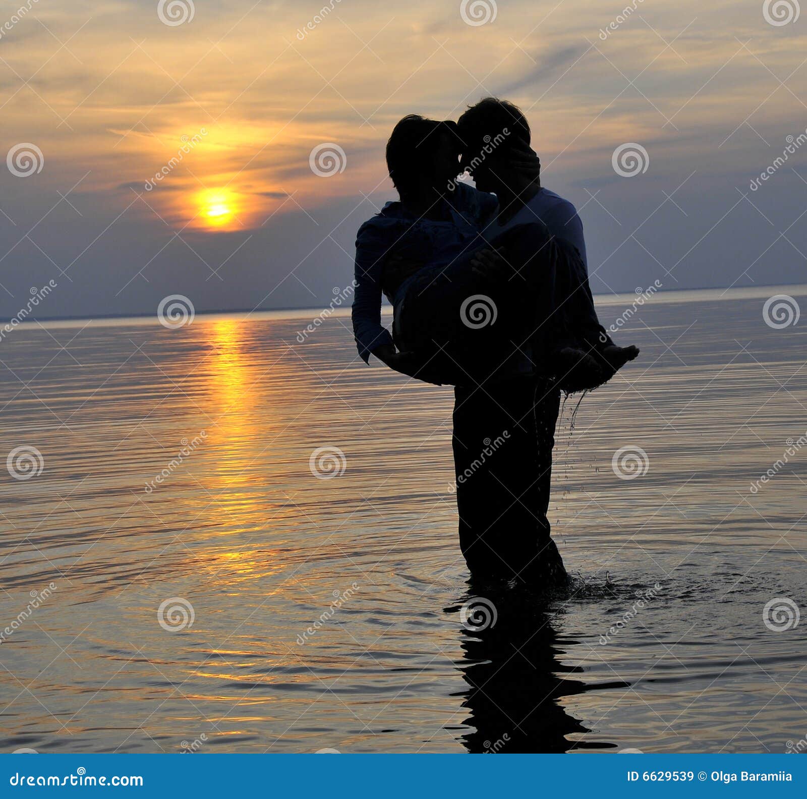 Romantic couple at sunset stock image. Image of female - 6629539