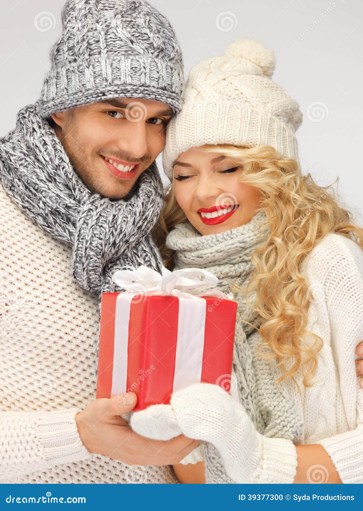 Romantic Couple in a Sweaters with Gift Box Stock Photo - Image of ...