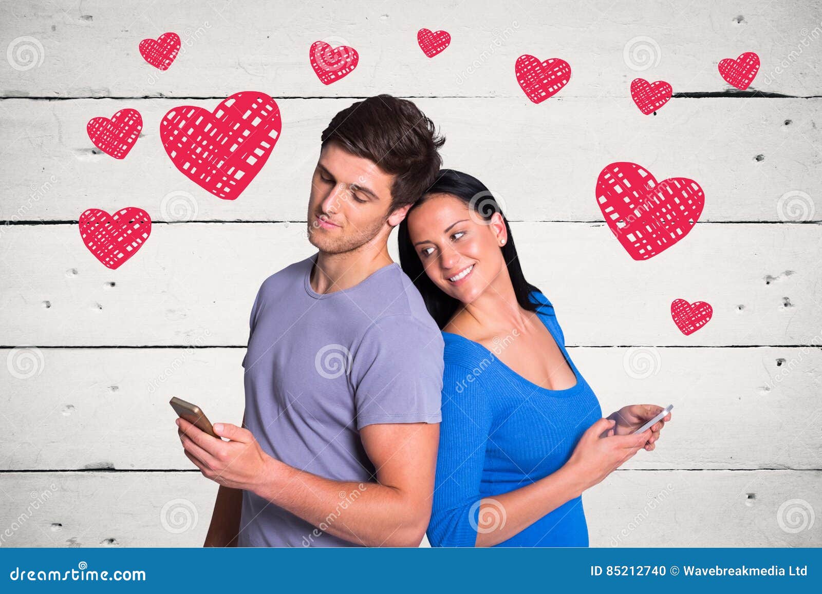 Romantic Couple Texting Message Against Red Hearts on Wooden Panel ...