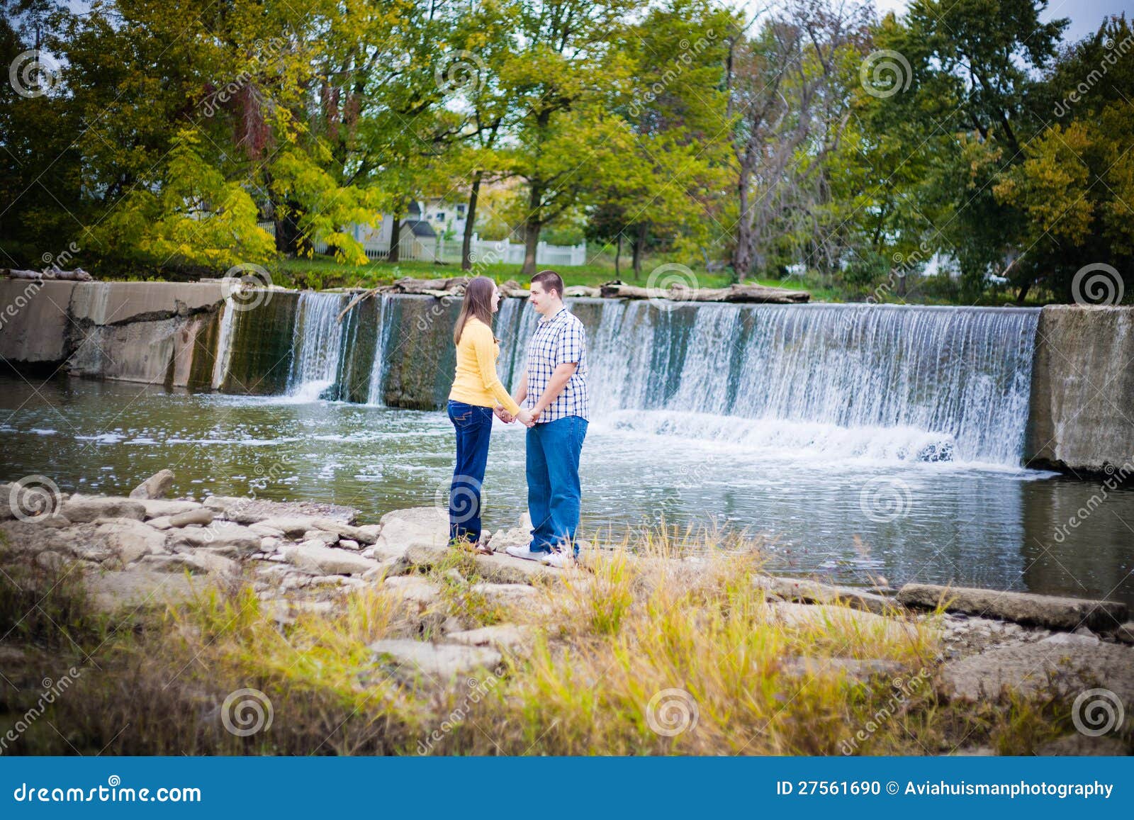 Romantic Couple by Waterfall Stock Photo - Image of future, discussing ...