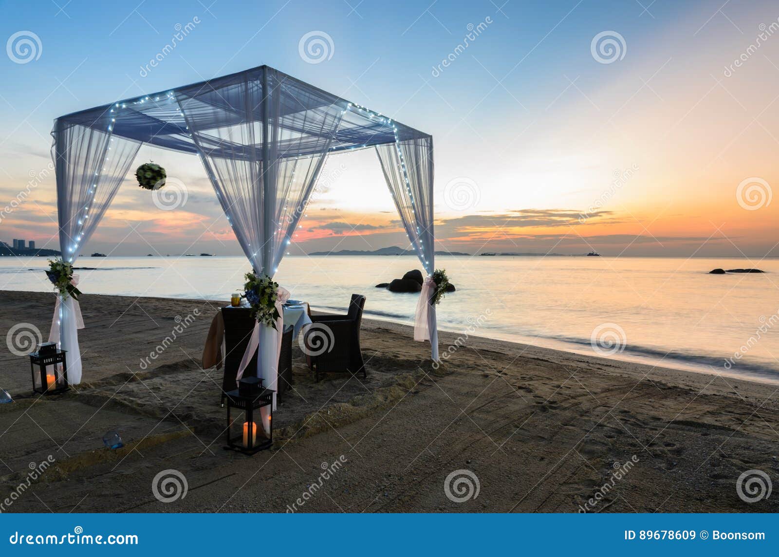 Romantic Dinner Setup on Beach at Sunset Stock Image - Image of dining ...