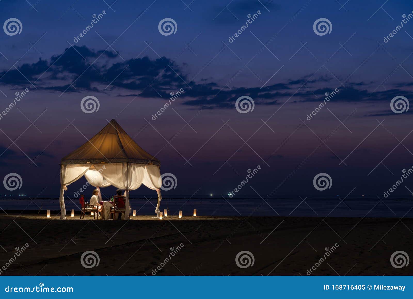 Romantic dinner tent setup stock image. Image of beach - 168716405