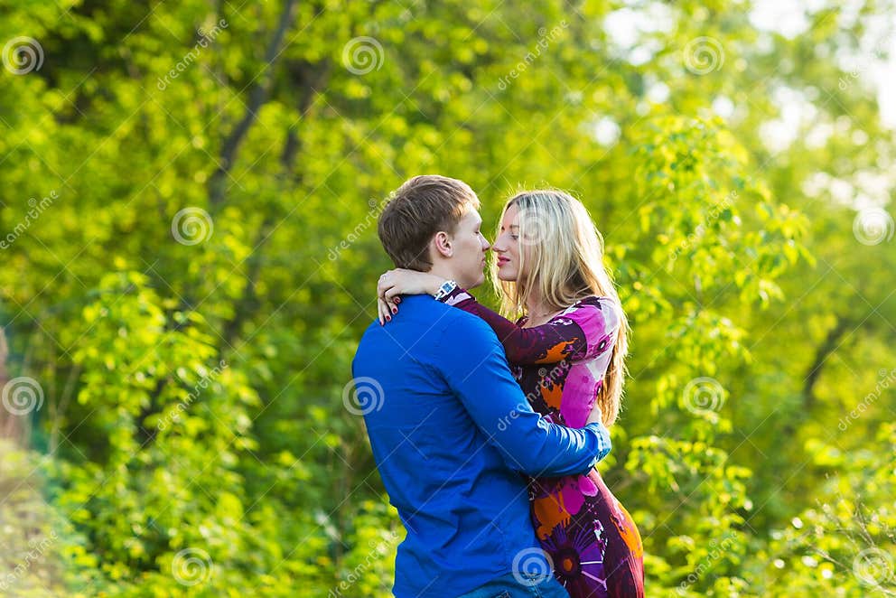 Romantic Happy Couple In Love On Nature Man And Woman Kissing In