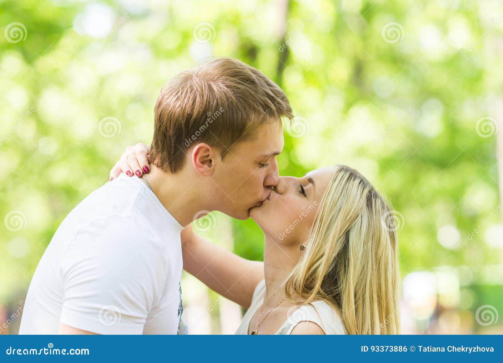 Romantic Happy Couple In Love On Nature Man And Woman Kissing In