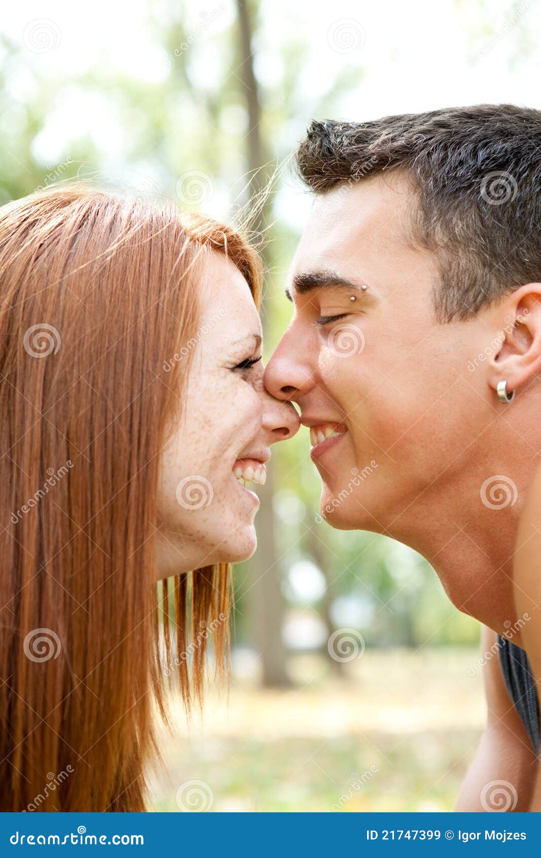 Romantic kiss stock image. Image of grass, male, female - 21747399