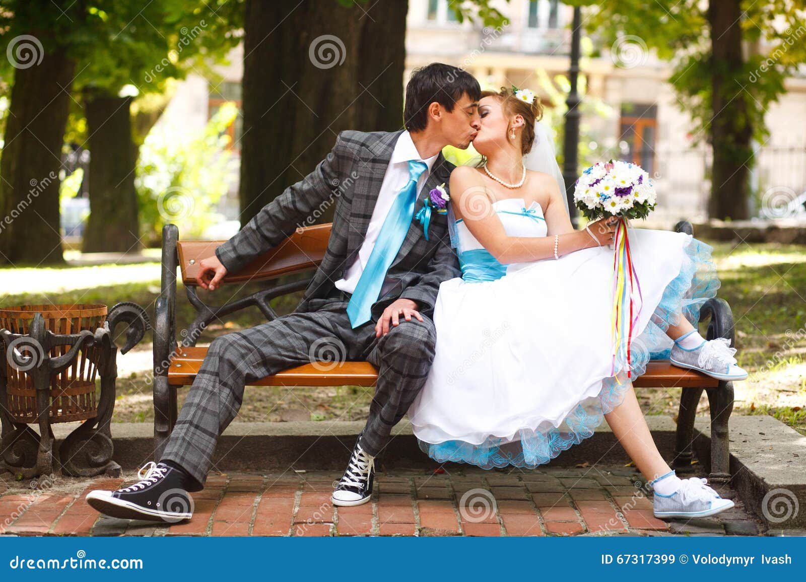 Romantic kiss on the bench stock image. Image of outdoor - 67317399