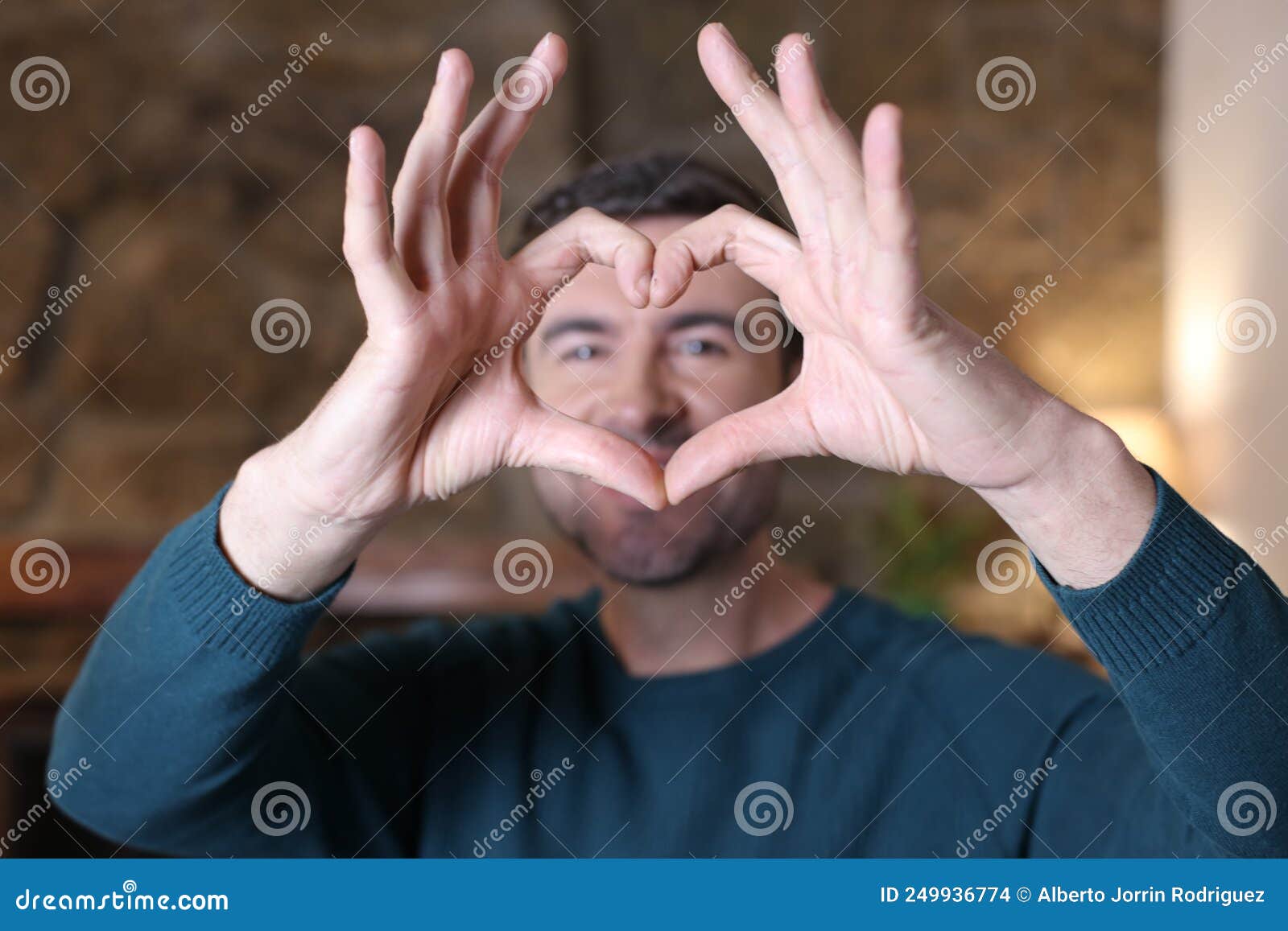 Romantic Man Showing Heart Shape with Hands Stock Photo - Image of ...