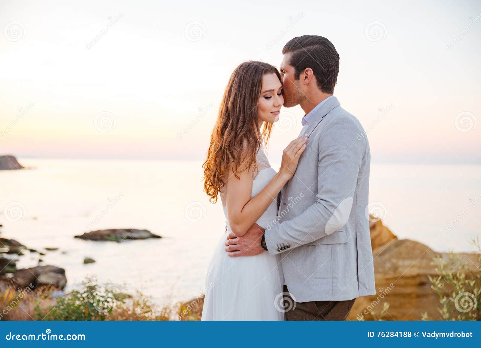 Romantic Married Couple Kissing on the Beach Stock Photo - Image of ...