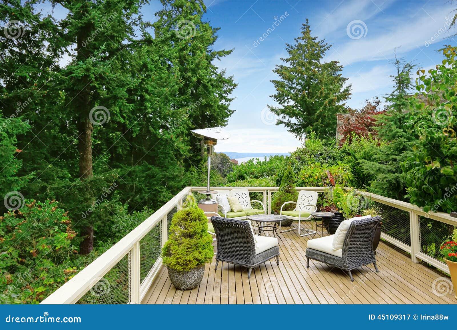 Romantic Patio Area on Walkout Deck with Bay View Stock Image - Image ...