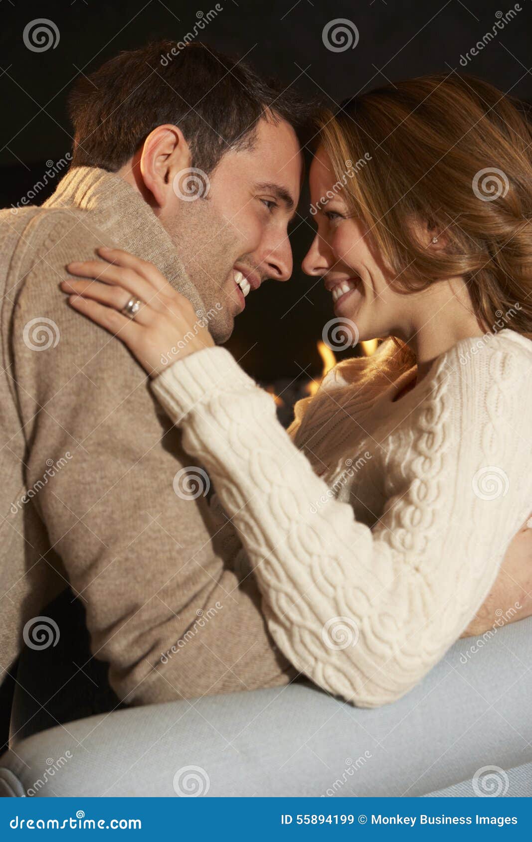 Romantic Portrait Couple in Front of Fire Stock Image - Image of loving ...