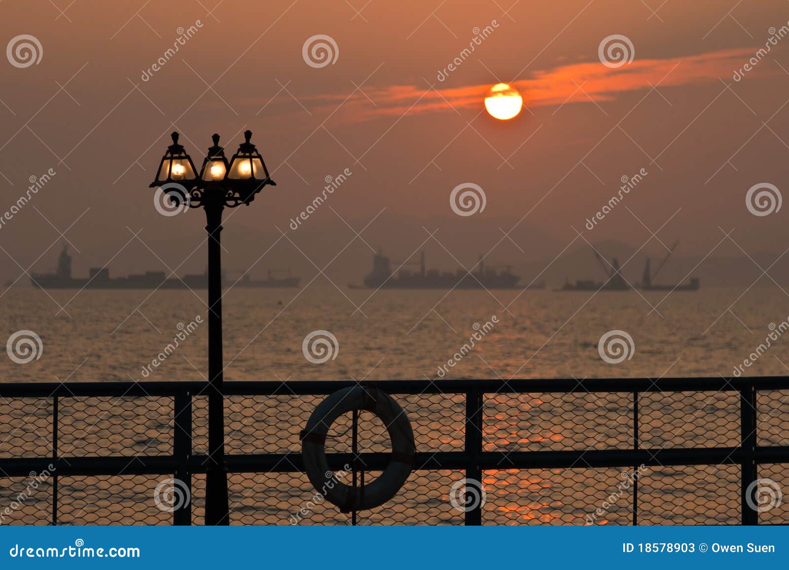 Romantic Sunset with Lamppost Stock Image - Image of lamppost, glow ...