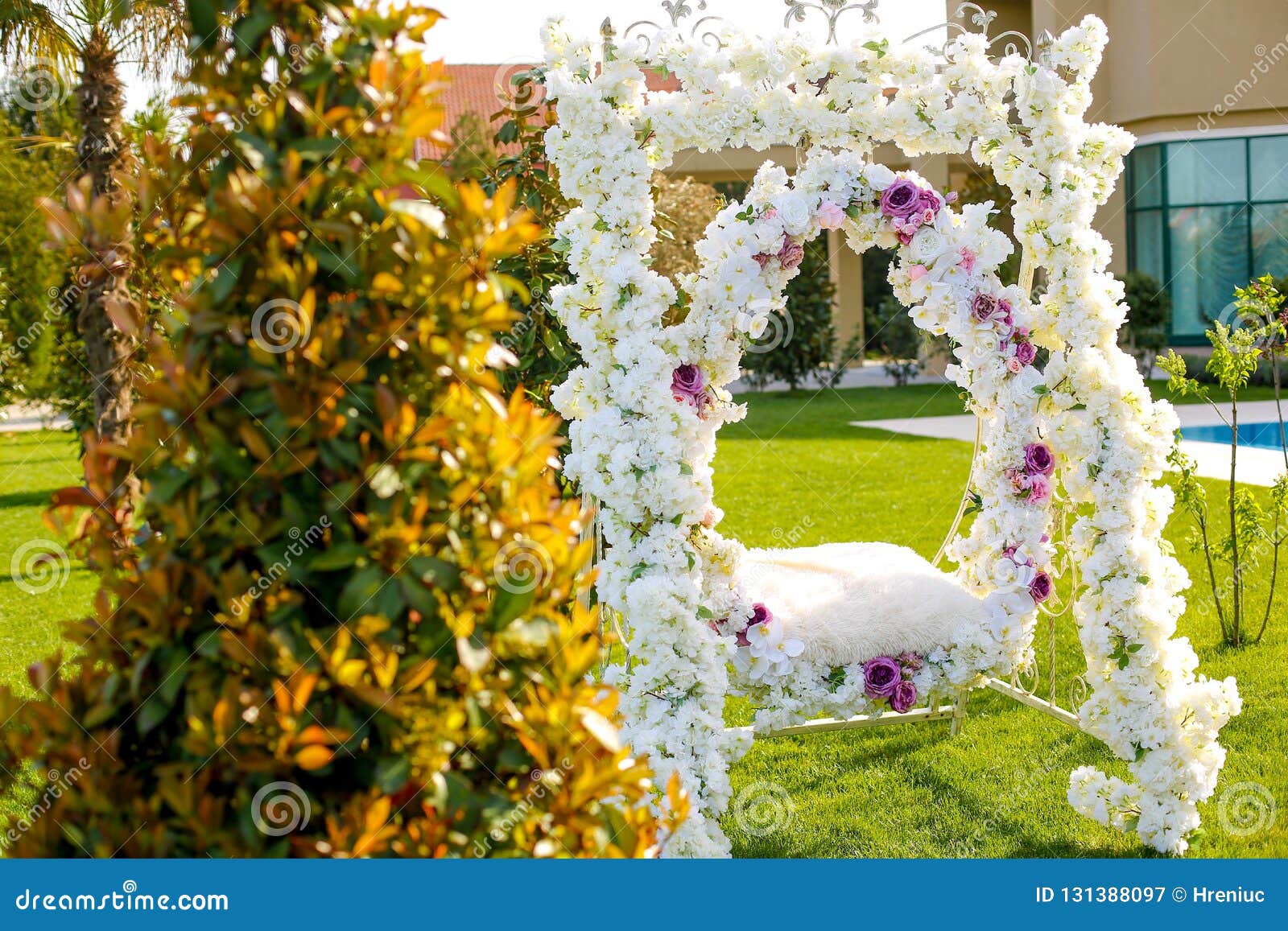 Romantic swing with roses stock image. Image of leaf - 131388097