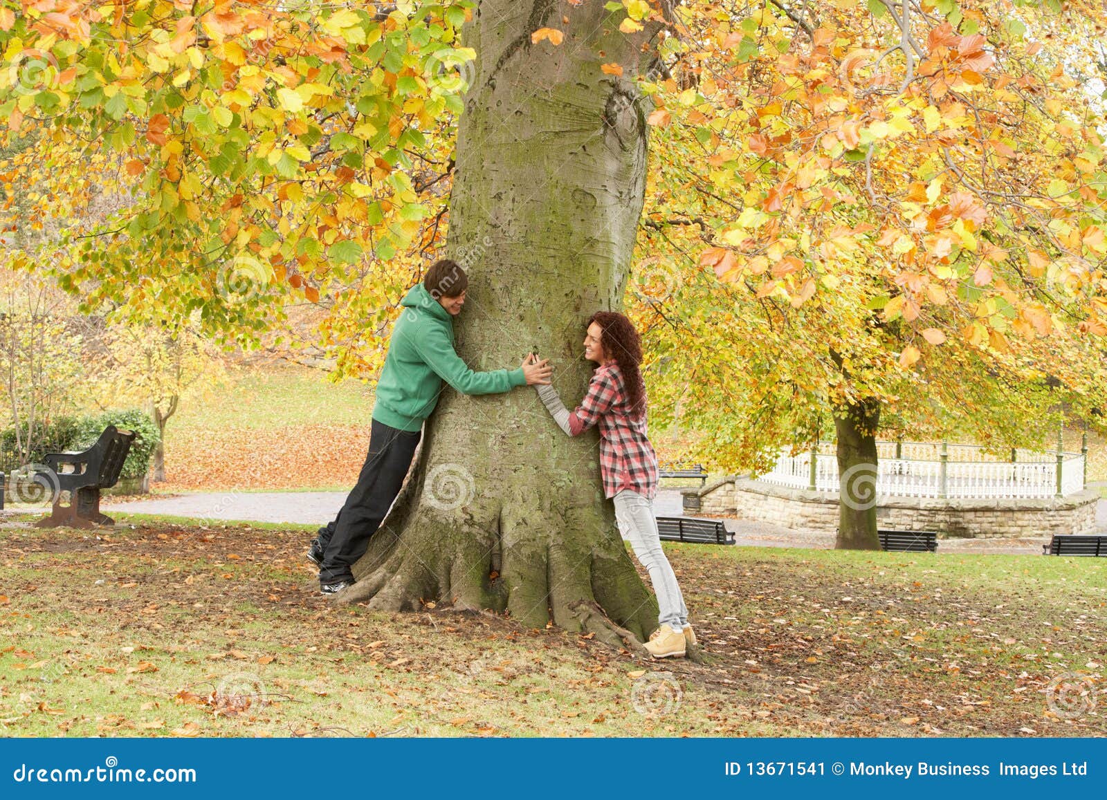 Romantic Teenage Couple by Tree Stock Image - Image of autumn ...