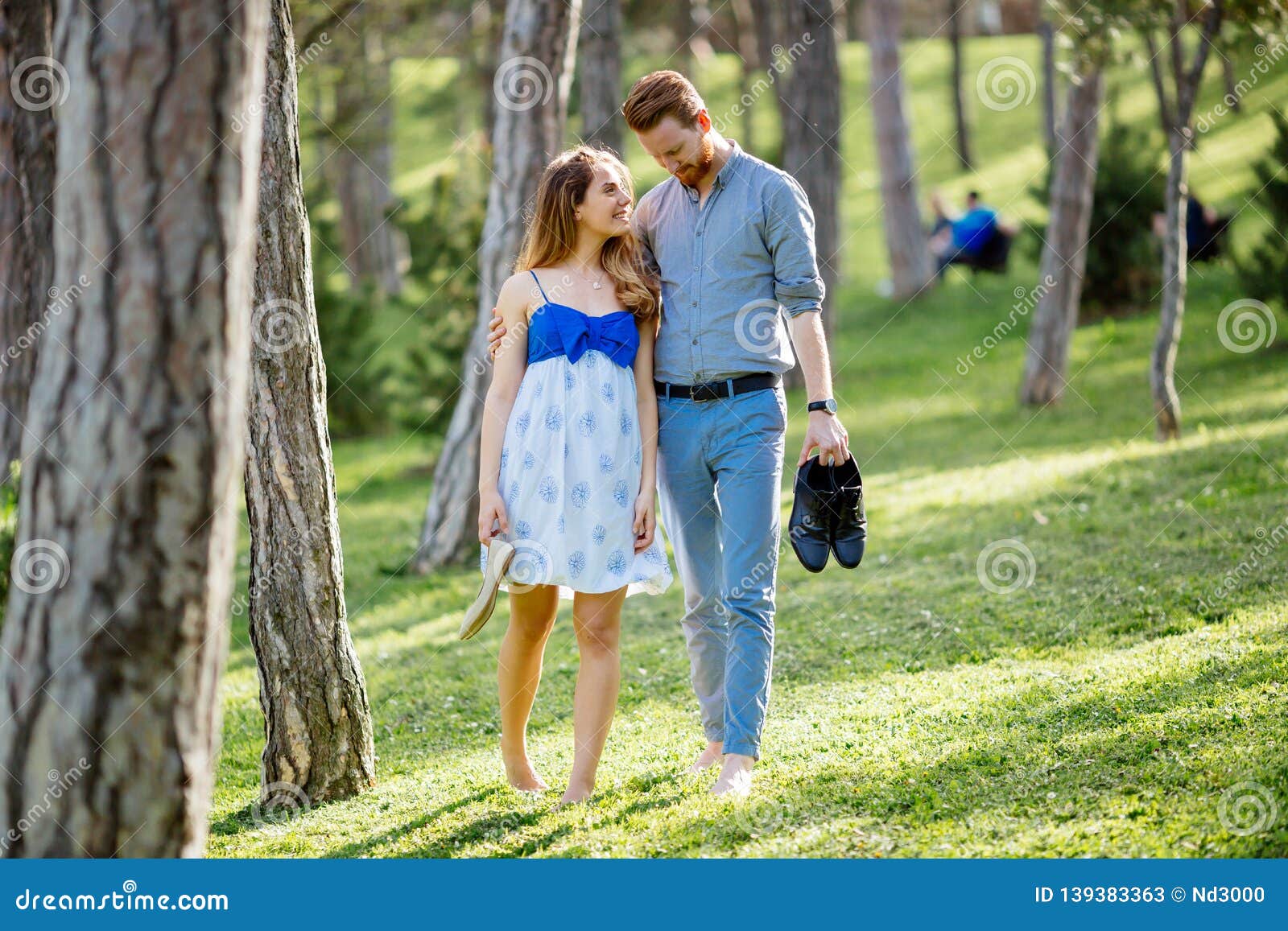Romantic walk in nature stock image. Image of embracing - 139383363