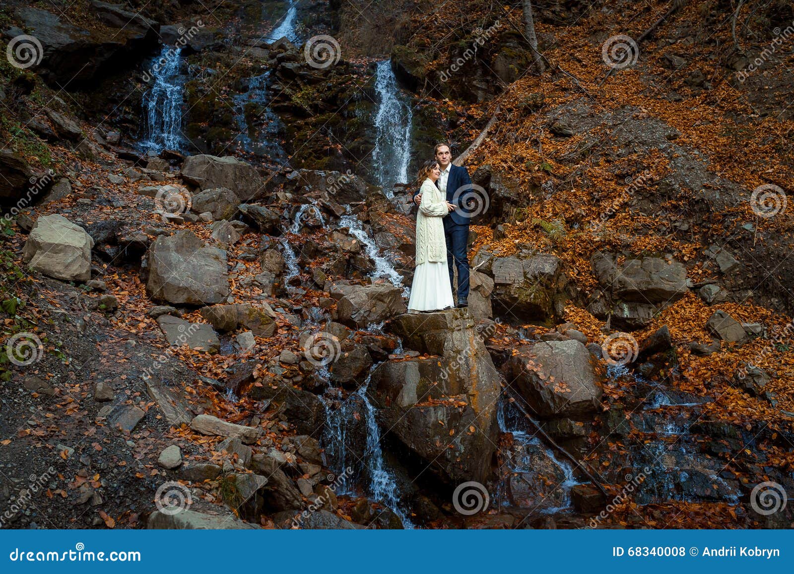 Romantic Wedding Couple. Waterfall on Background Stock Photo - Image of ...