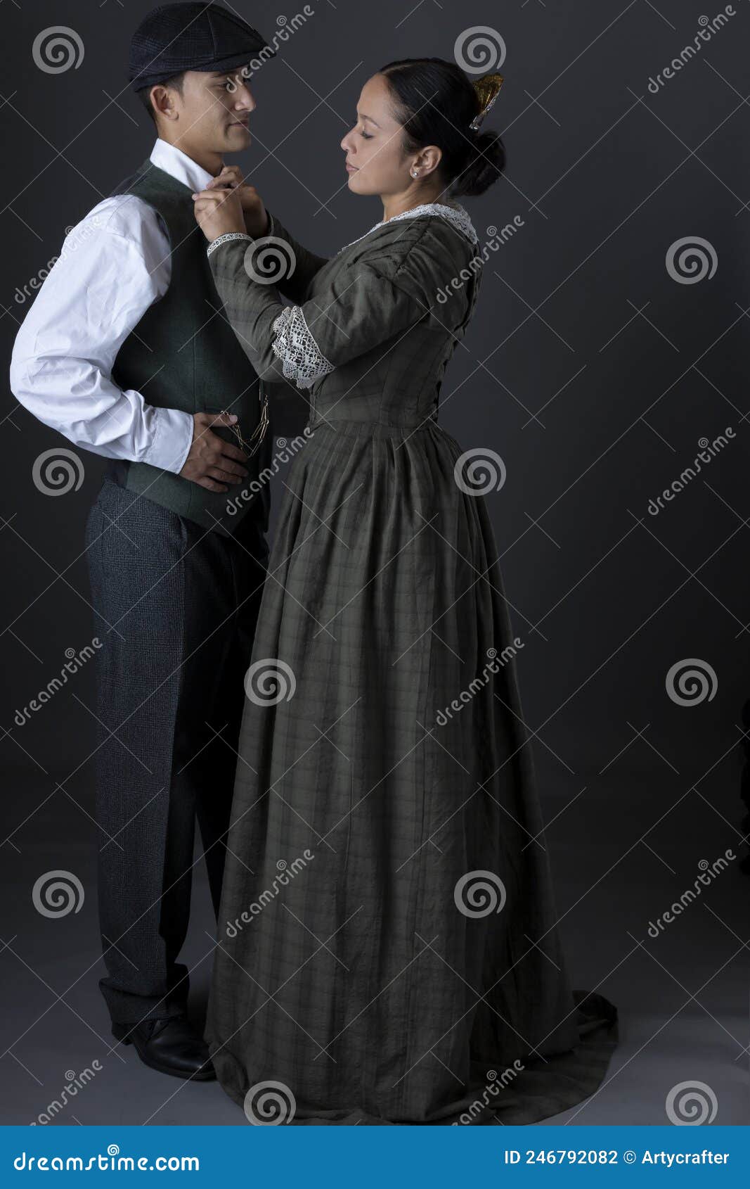 A Romantic Working Class Victorian Couple Standing Together Against a ...