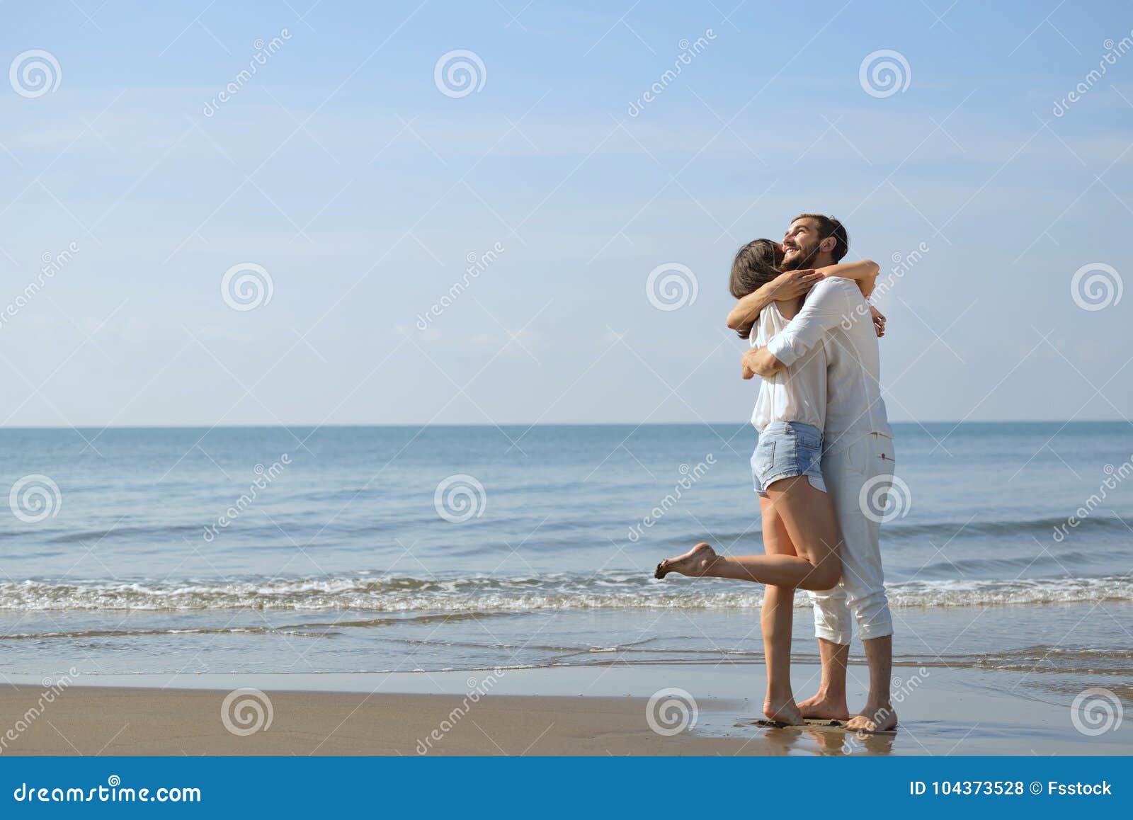 Romantic Young Couple on the Beach Kissing. Stock Photo - Image of ...