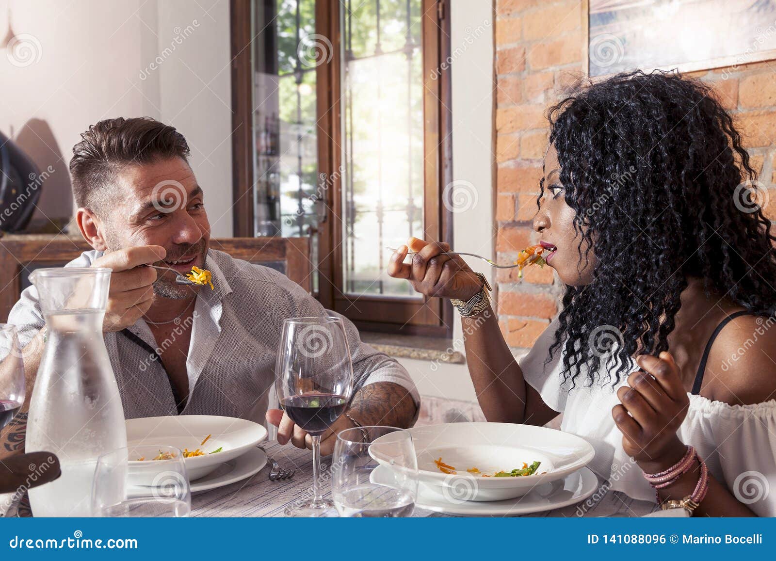Romantic Young Couple Dining at a Nice Restaurant Stock Photo - Image ... Romantic Young Couple Dining at a Nice Restaurant Stock Photo - Image ...