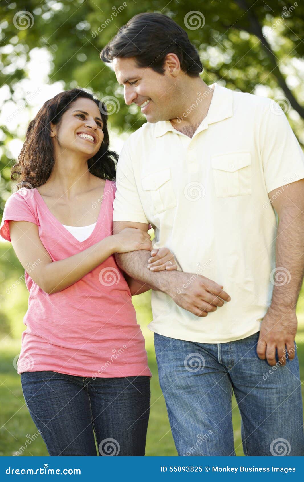 Romantic Young Hispanic Couple Walking in Park Stock Image - Image of ...